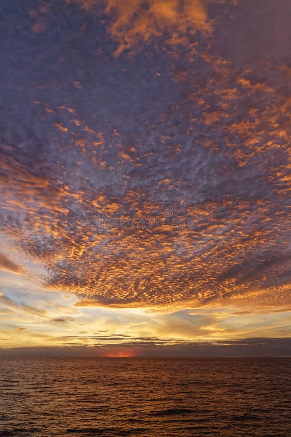 The Setting Sun Dramatically Lighting Up the Low Clouds on a Summers ...