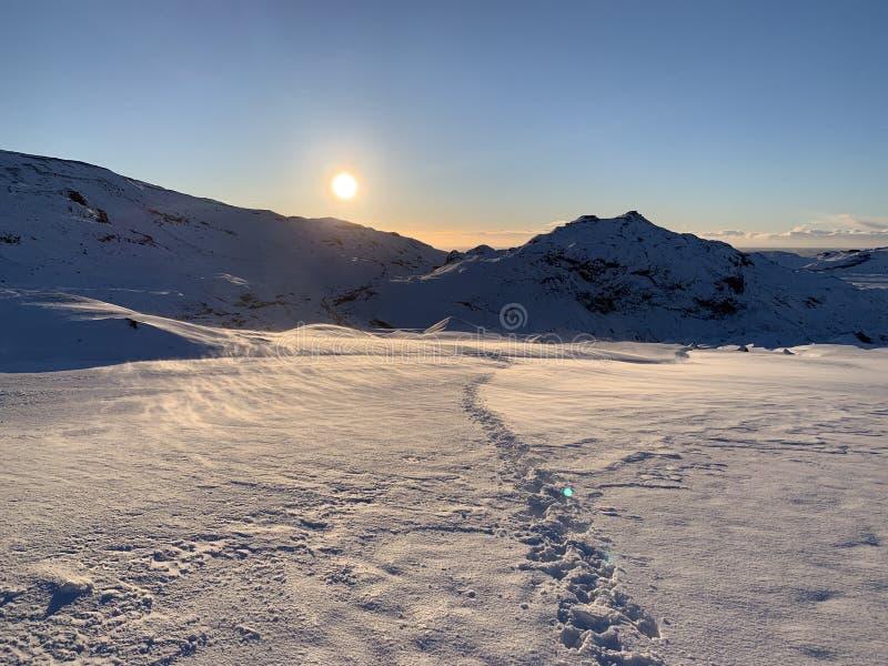 Setting sun on glacier stock photo. Image of vacation - 158466042
