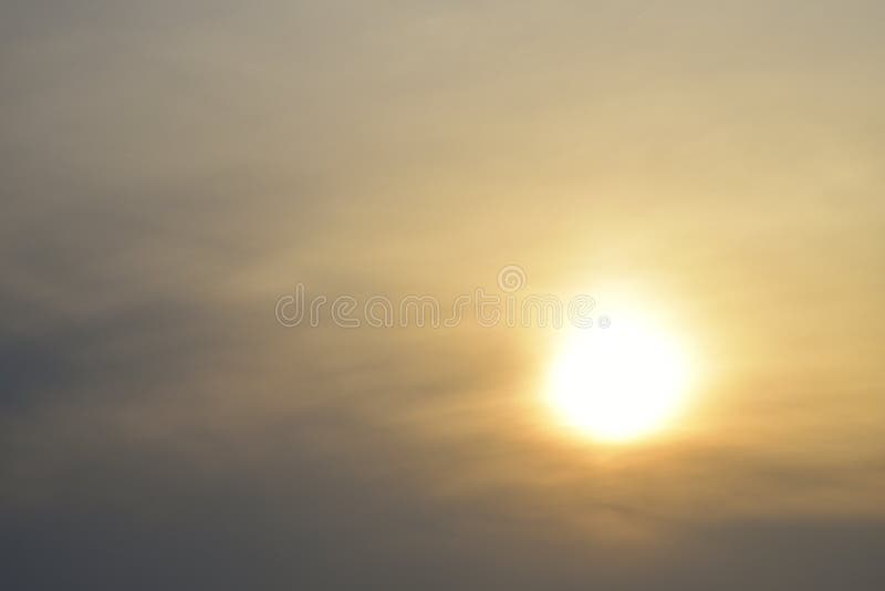 The Setting Sun in the Haze and Clouds Stock Photo - Image of sunset ...