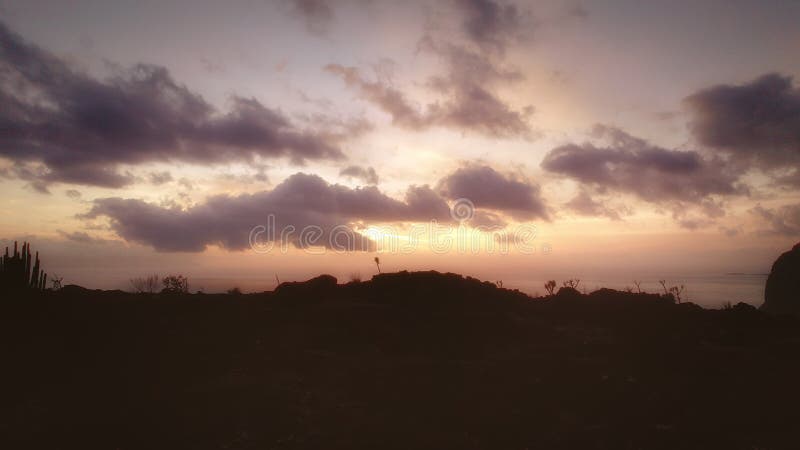 The Setting Sun Illuminates the Horizon with Warm Colors, Casting a ...