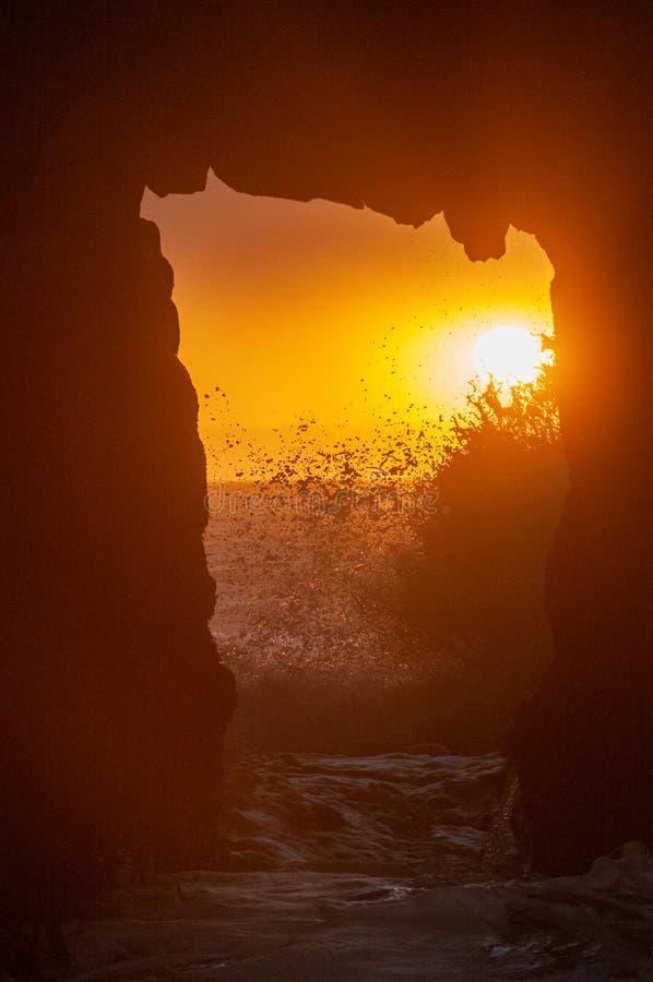 Keyhole Arch at Pfeiffer Beach Stock Image - Image of cliff, arch ...