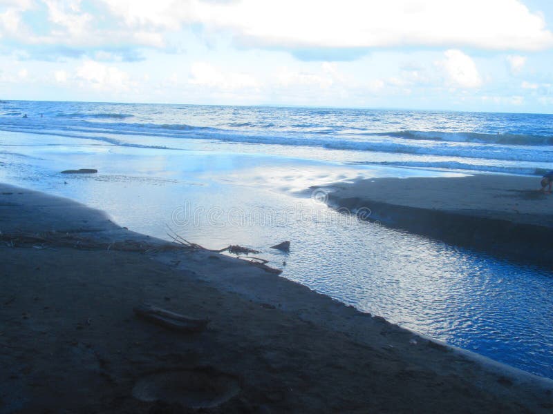 The Setting Sun is Reflected in the Sea Stock Photo - Image of beach ...