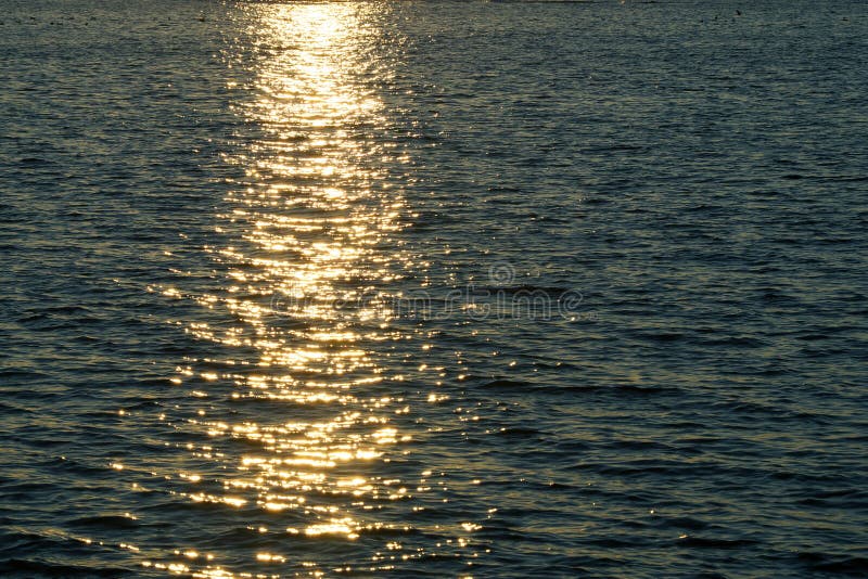 The Setting Sun is Reflected in the Water Stock Image - Image of ...