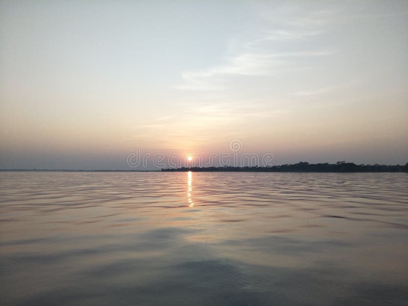 Setting sun stock photo. Image of payra, setting, river - 157753438