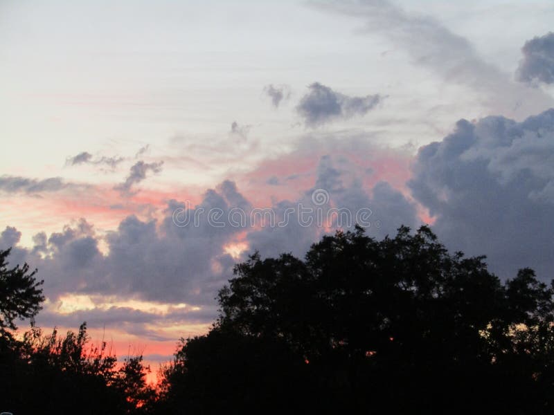 Setting Sun stock photo. Image of clouds, sunset, setting - 142729286