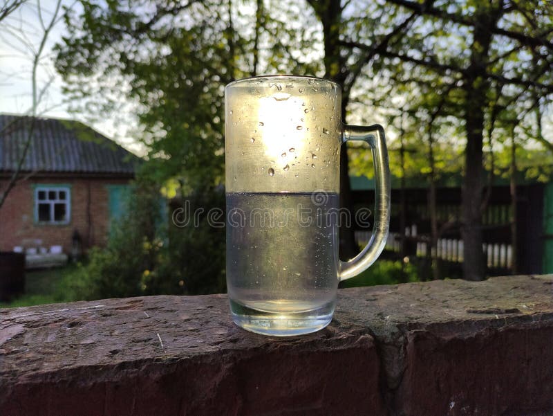 Setting Sun in a Transparent Glass Stock Photo - Image of liquid, dawn ...