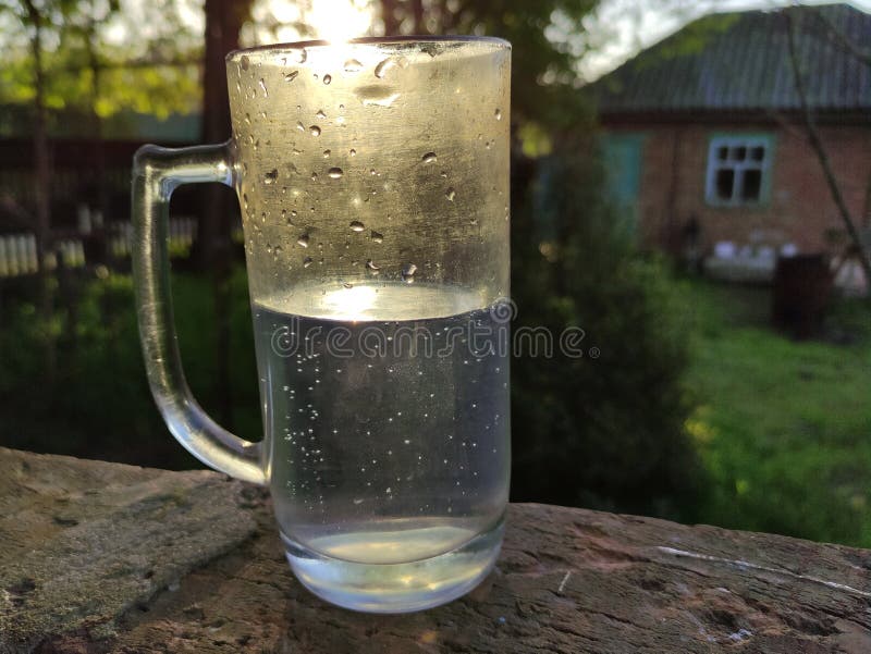 Setting Sun in a Transparent Glass Stock Image - Image of harmony ...