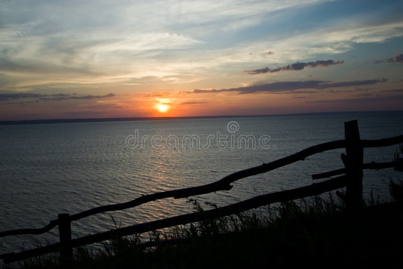 The Setting Sun in the Volga River Stock Photo - Image of cloud, fence ...