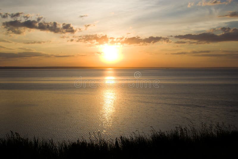 The Setting Sun in the Volga River Stock Image - Image of cloudy ...
