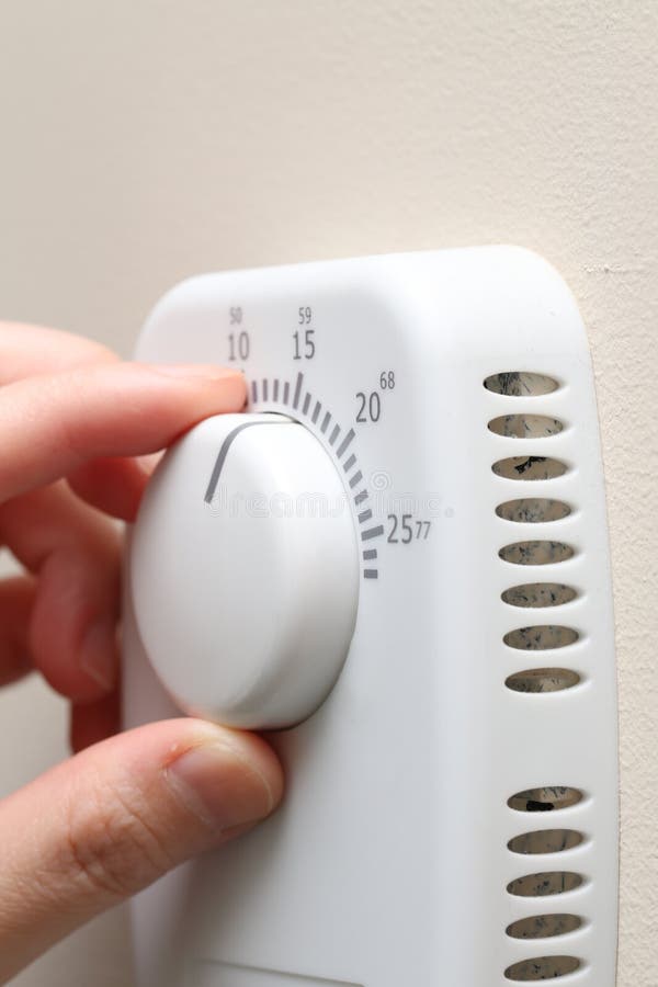 Thermostat Temperature Setting in a Modern Home Stock Photo - Image of ...