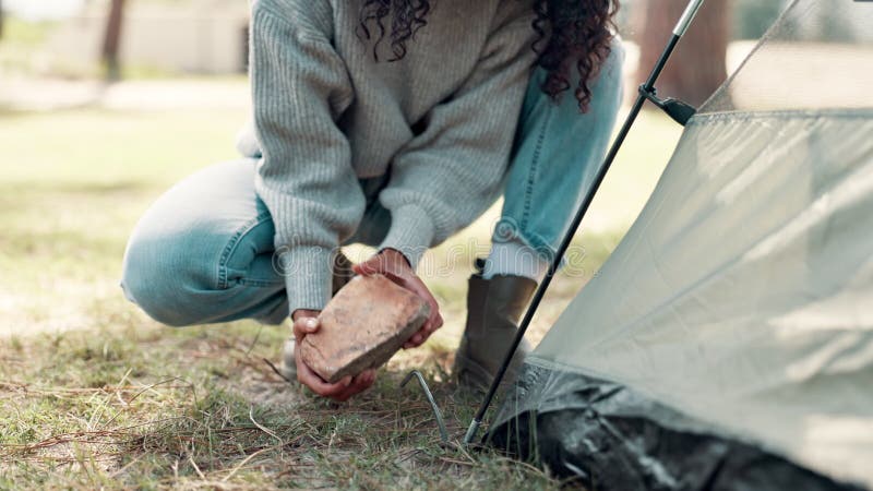 Setting Up, Camping and Tent in Nature with Rock and Nail for Secure ...
