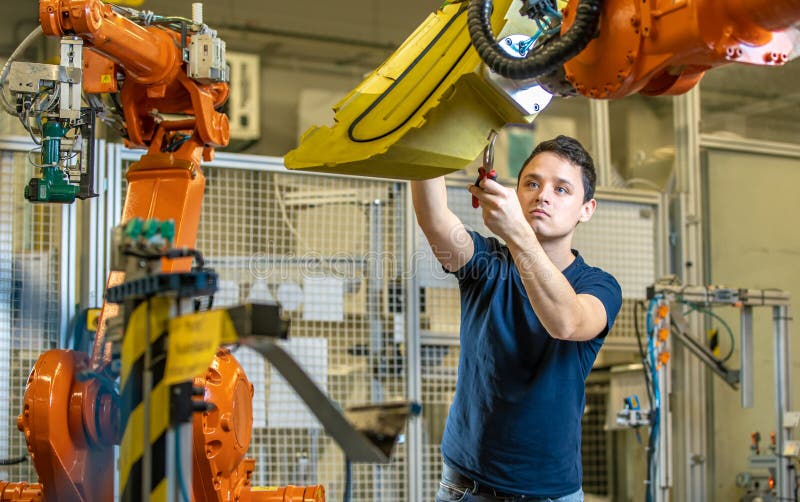 Setting Up a Robotic Line with Automatic Arms before Starting the ...
