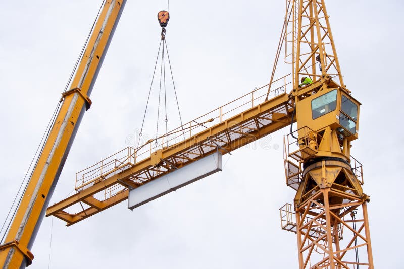 Setting up a tower crane stock photo. Image of site, metal - 20900974