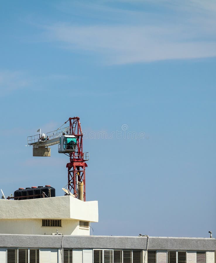 Setting Up a Tower Crane in the Construction Site. the Counter Stock ...