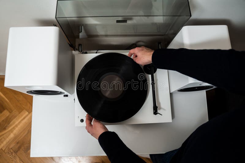 Setting Up Vinyl Speaker System. Musicians Hands Adjusting Vinyl Disc ...