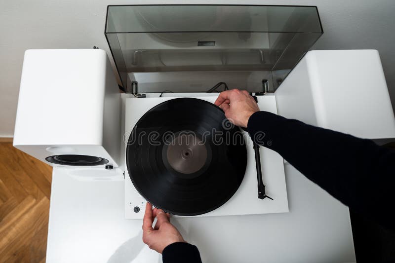 Setting Up Vinyl Speaker System. Musicians Hands Adjusting Vinyl Disc ...