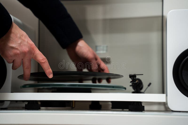 Setting Up Vinyl Speaker System. Musicians Hands Adjusting Vinyl Disc ...
