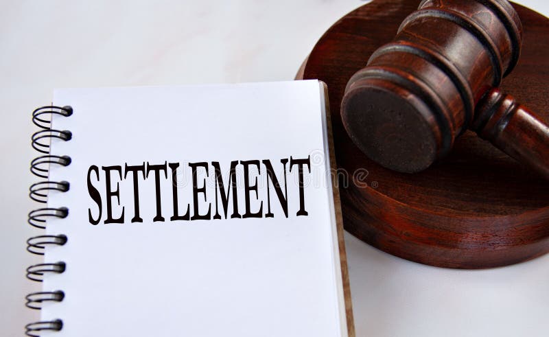 SETTLEMENT - Word in a White Notebook with a Judge S Gavel in the ...