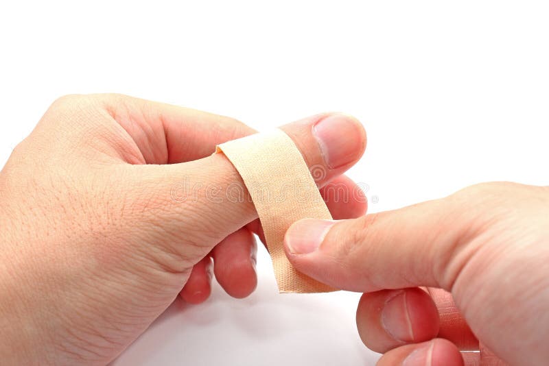 Verband Auf Dem Aufgeteilten Hintergrund Des Daumens Stockfoto - Bild ...