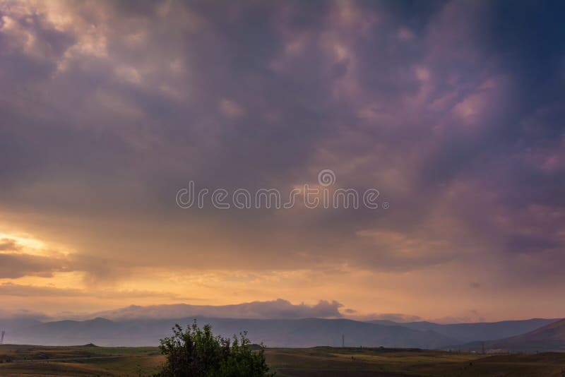 Rural Landscape of Sunset with Mountains and Meadows Stock Photo ...