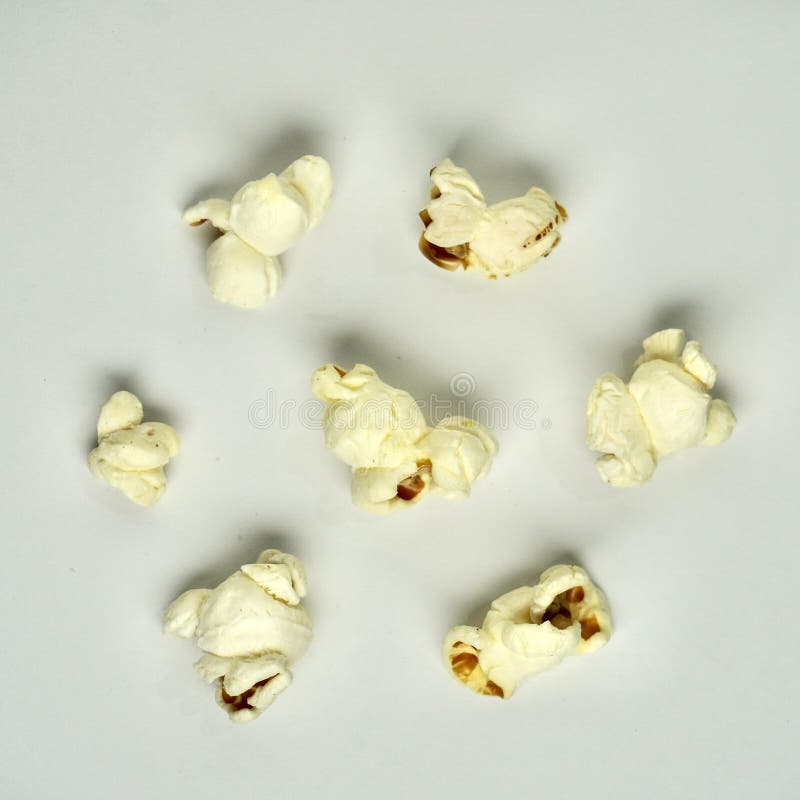 Seven pieces of pop corns stock image. Image of popcorn - 349325045