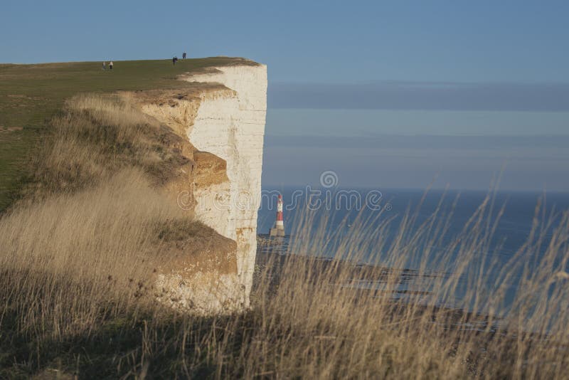 Seven Sisters - White Cliffs, a Lighthouse and Blue Seas on a Sunny Day ...