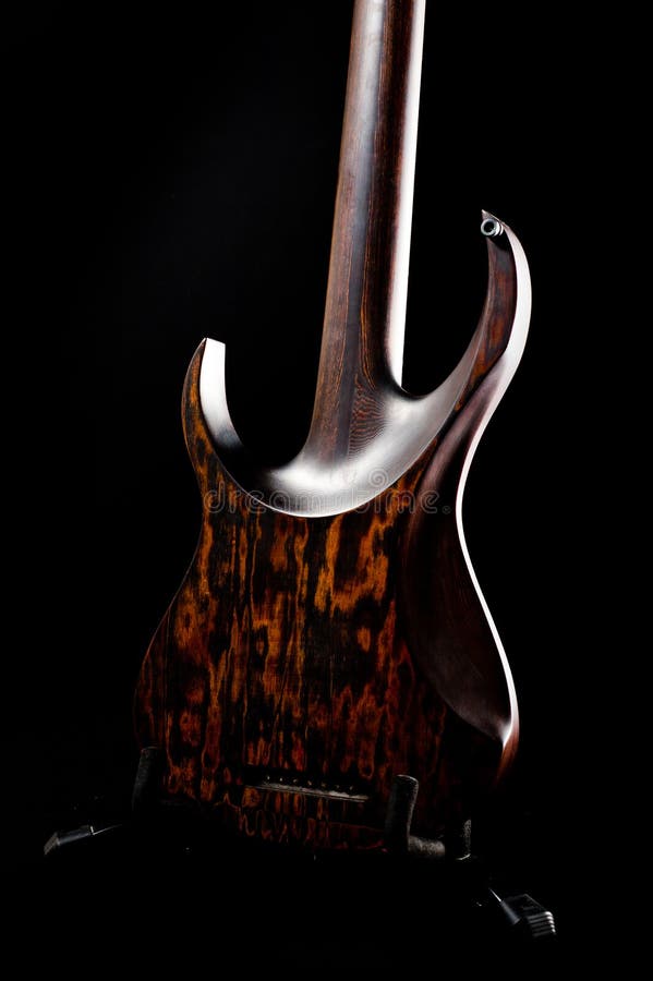 Seven-string Electric Guitar Made of Dark Wood. Background for Music ...