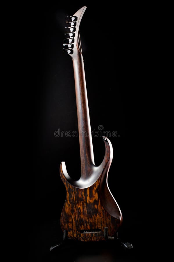Seven-string Electric Guitar Made of Dark Wood. Background for Music ...