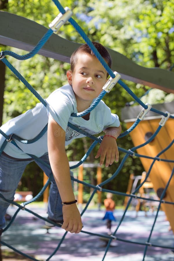 Seven-year-old Boy on the Playground Stock Image - Image of brave, camp ...