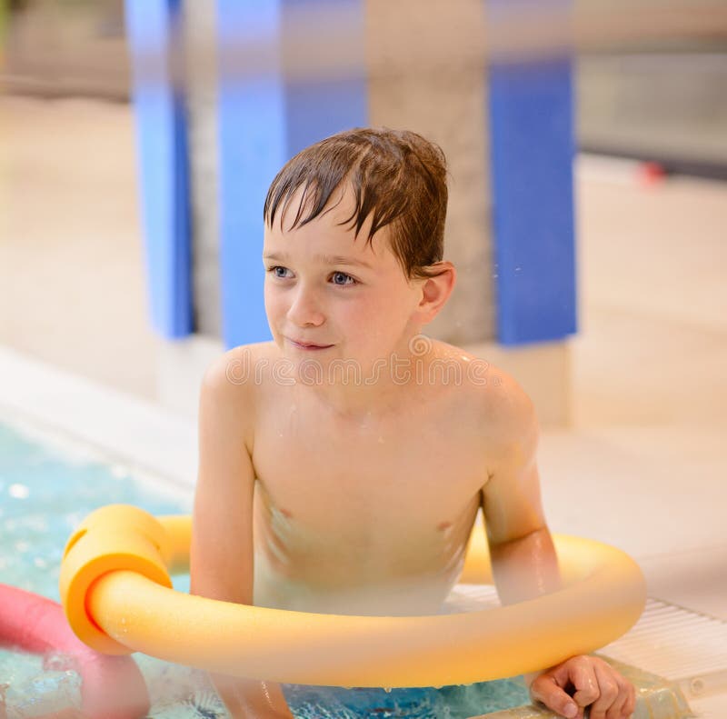 Seven Years Old Boy Learning To Swim at the Pool Stock Photo - Image of ...