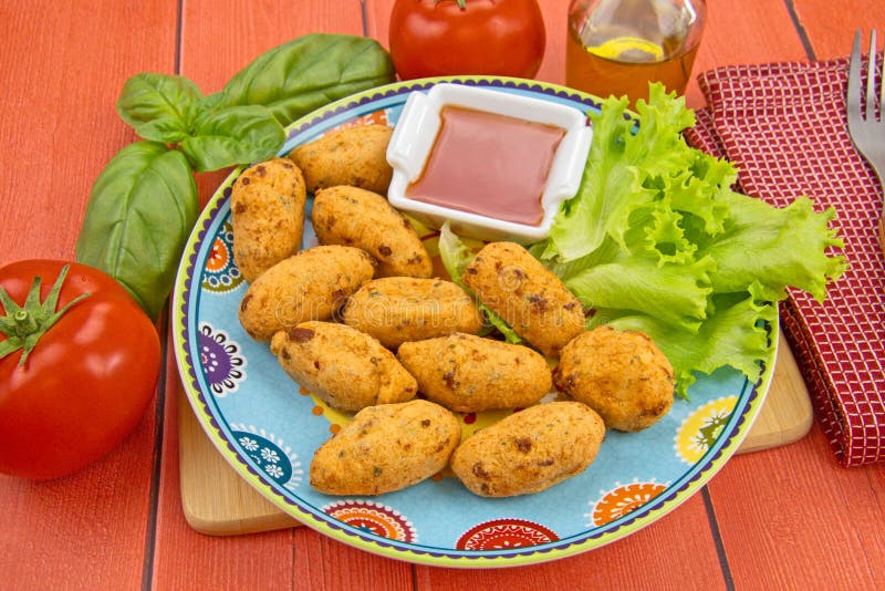 Accras on a plate stock image. Image of fritters, creole - 225184929