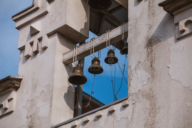 Several Bells of Different Sizes on the Wall of the White Temple Stock ...