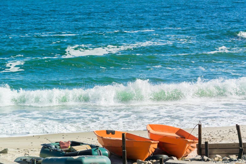 Several Boats Stand on the Sandy Shore by the Sea Stock Image - Image ...