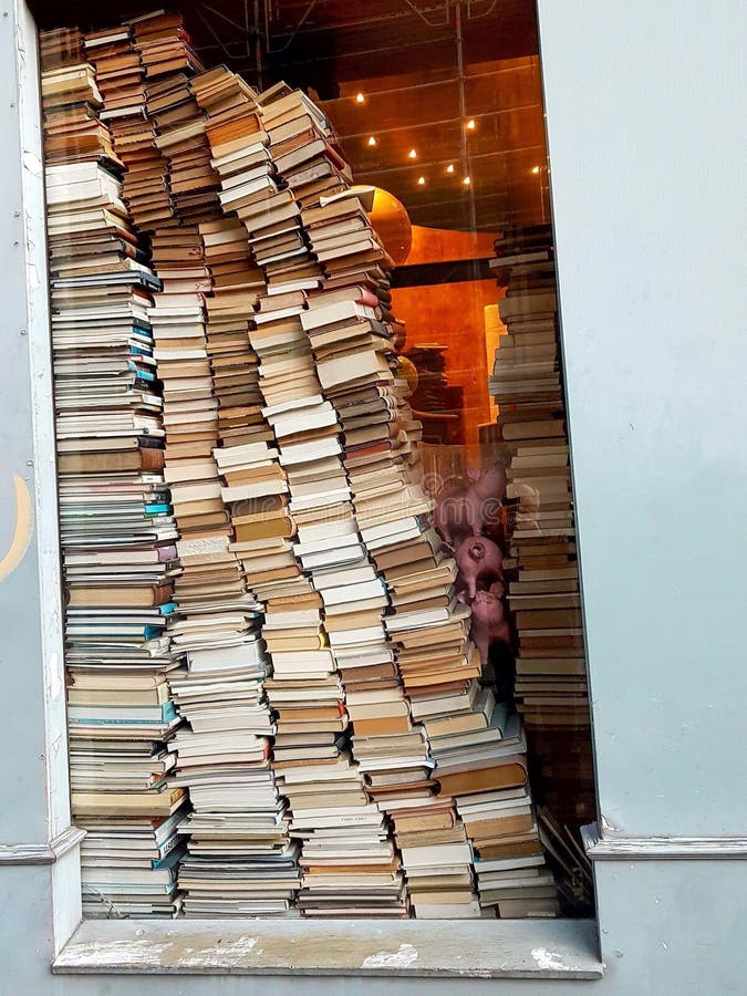 Several Books Stacked in a Bookstore Window Stock Image - Image of ...