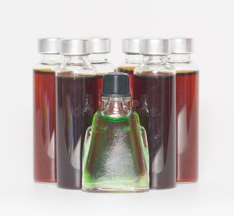 Several Bottles of Liquid Medicine Stock Image - Image of brown ...