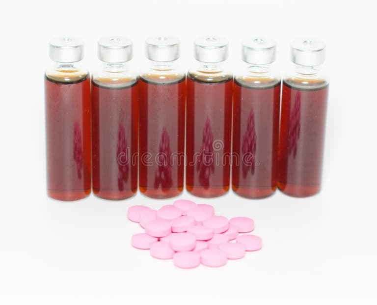 Several Bottles of Liquid Medicine and Pills Stock Photo - Image of ...