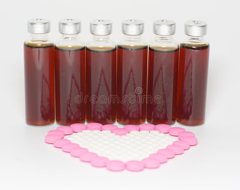 Several Bottles of Liquid Medicine and Pills Stock Photo - Image of ...