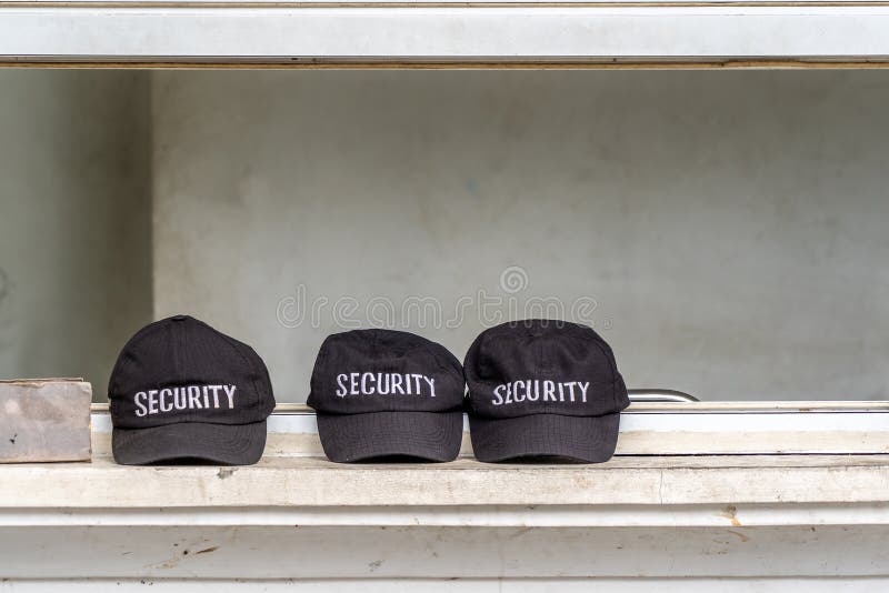 Security caps in a row stock photo. Image of power, armed - 159705208