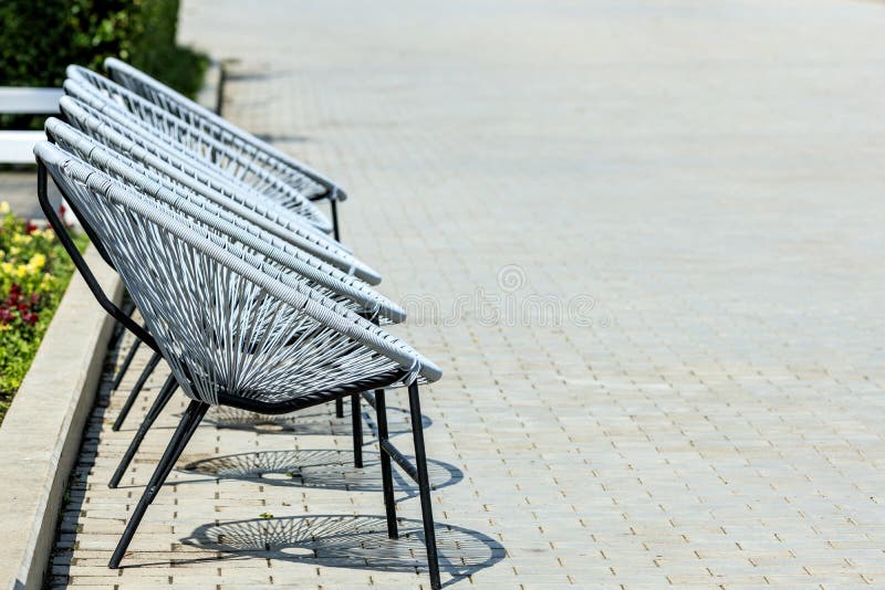 Several Chairs Standing on the Pavement Outdoors on a Summer Day Stock ...