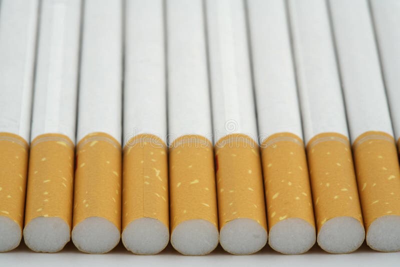 Several Cigarettes Stacked on Table Stock Photo - Image of close ...
