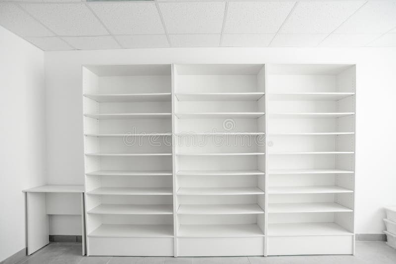 Empty white shelves stock photo. Image of blank, equipment - 110140394