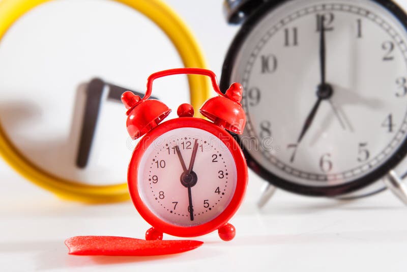 Several Clock Faces of Different Sizes, Styles and Time Stock Image ...