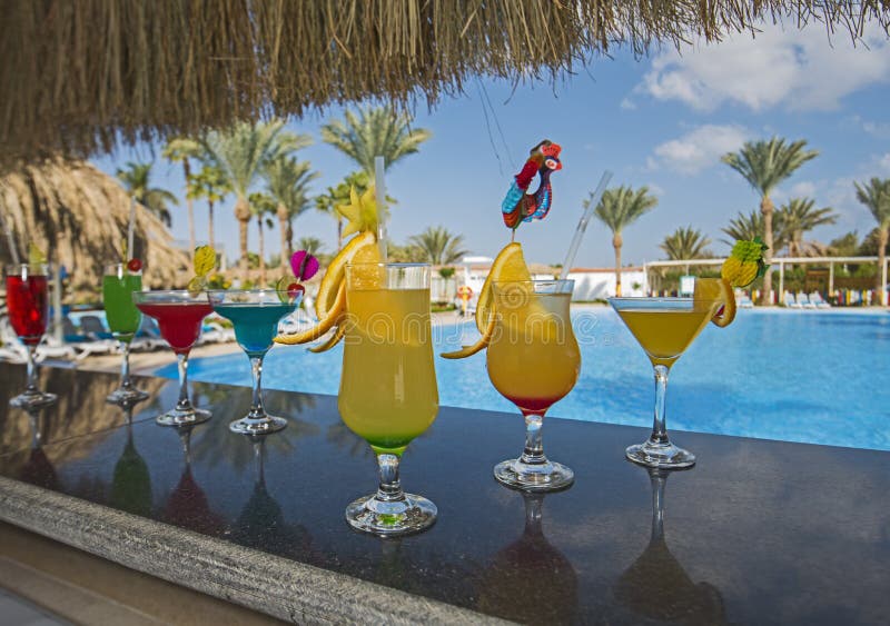 Cocktail Drinks by a Swimming Pool Stock Photo - Image of luxury ...