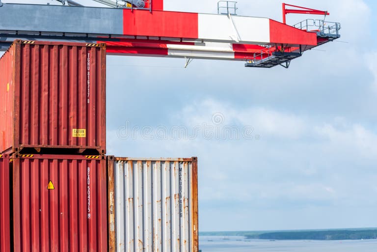 Several Containers are Stacked on the Deck of a Cargo Ship, with a ...