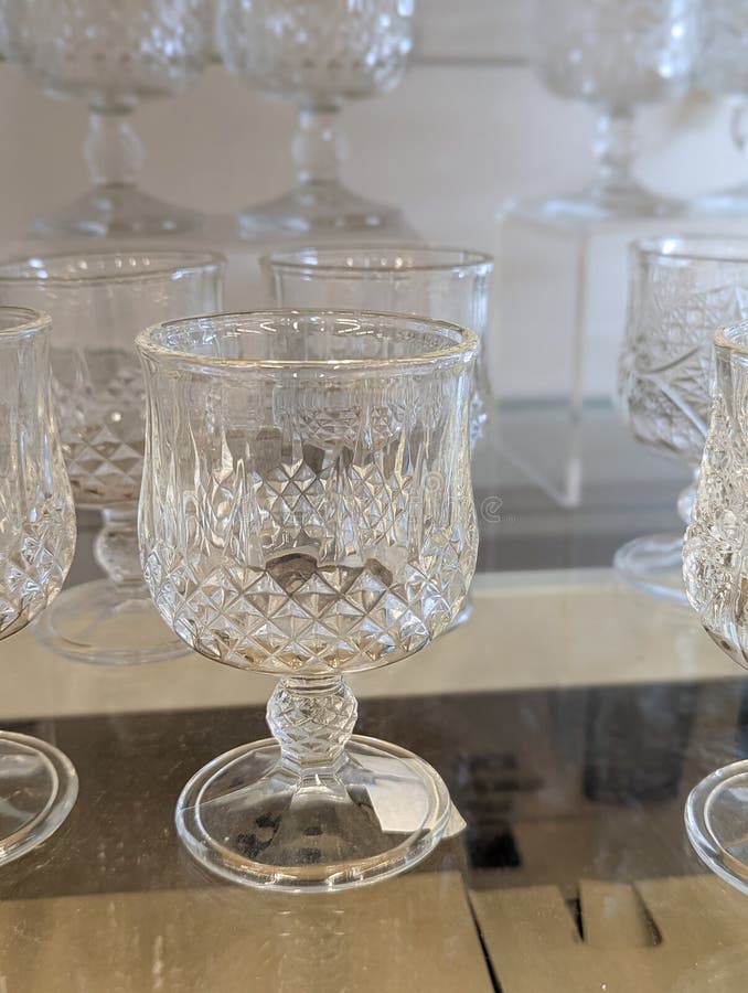 Several crystal Cut Stemmed Glasses Arranged in Rows. Stock Image ...