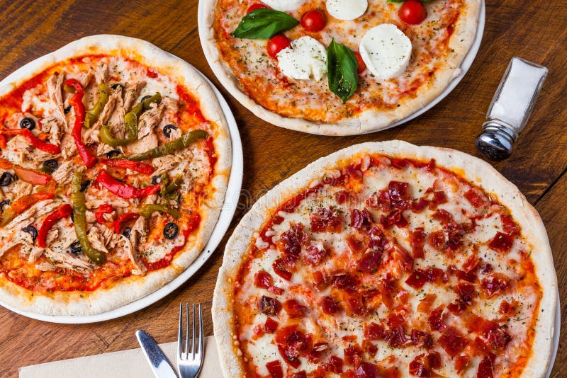 Several different pizzas stock image. Image of pepper - 90705161