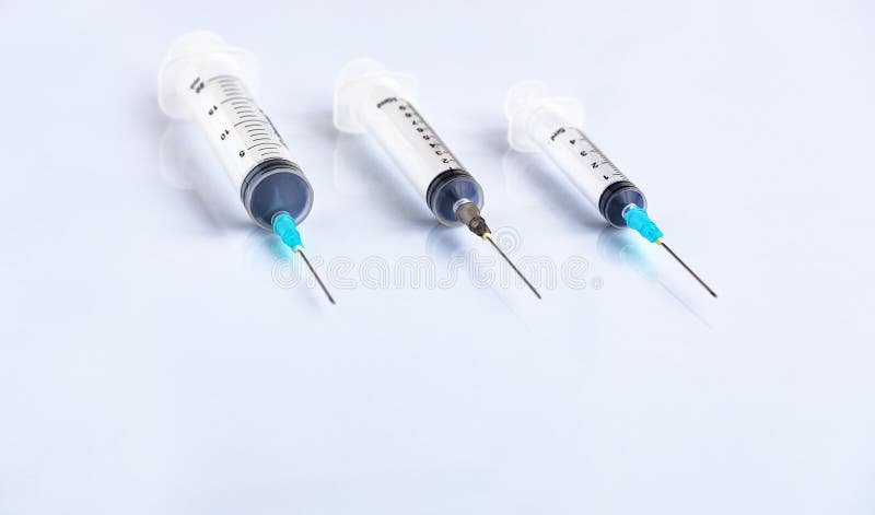 Several Different Syringes on a White Smooth Table, Ready for Use Stock ...