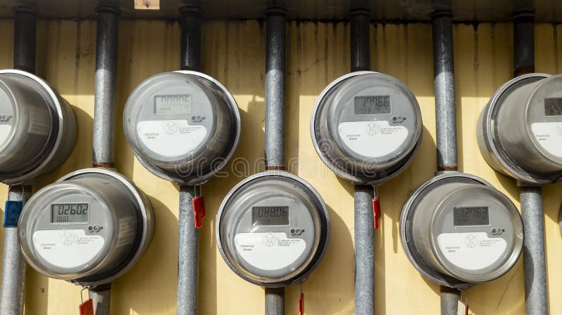 Several Digital Electric Meters Installed on the Wall at an Apartment ...