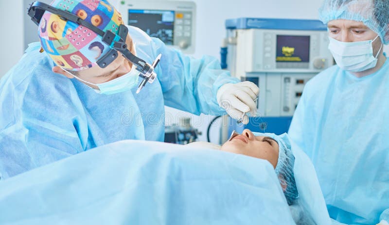 Several Doctors Surrounding Patient on Operation Table during T Stock ...