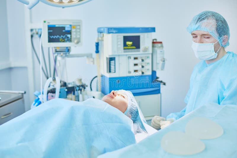 Several Doctors Surrounding Patient on Operation Table during Their ...
